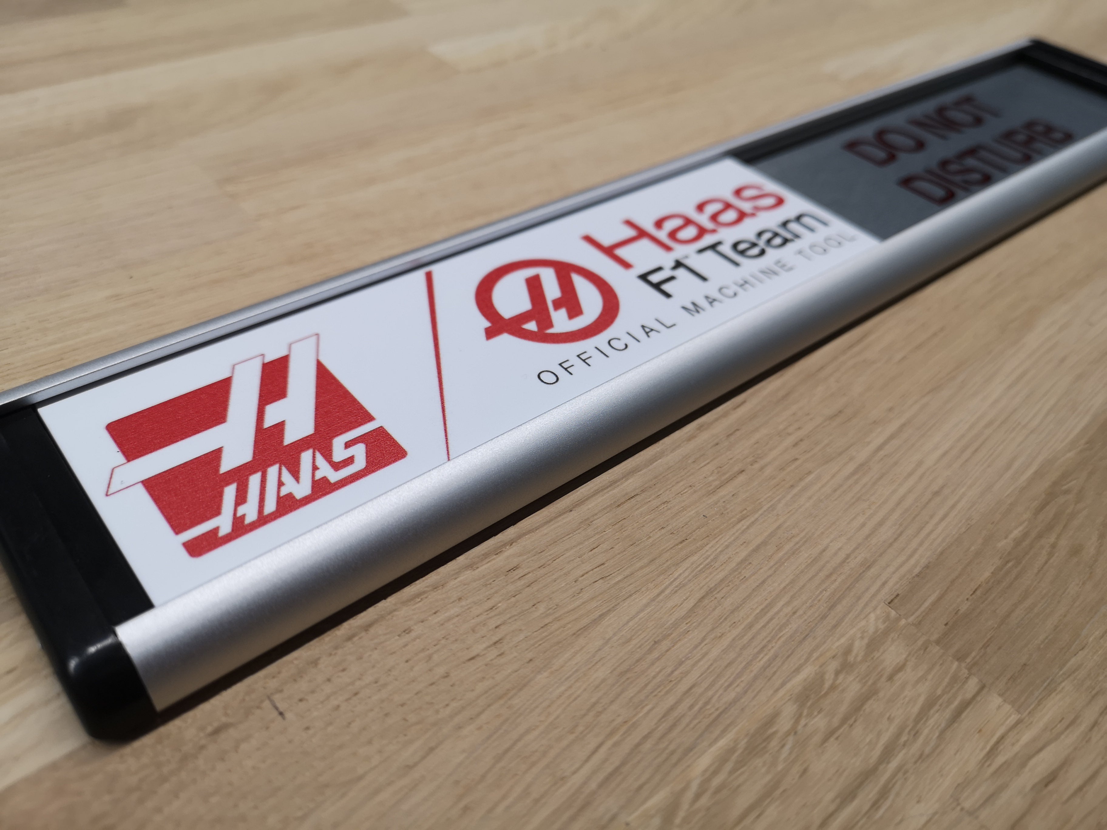 Bespoke Sliding Signs for Haas F1 Team in Belgium | Viro Display