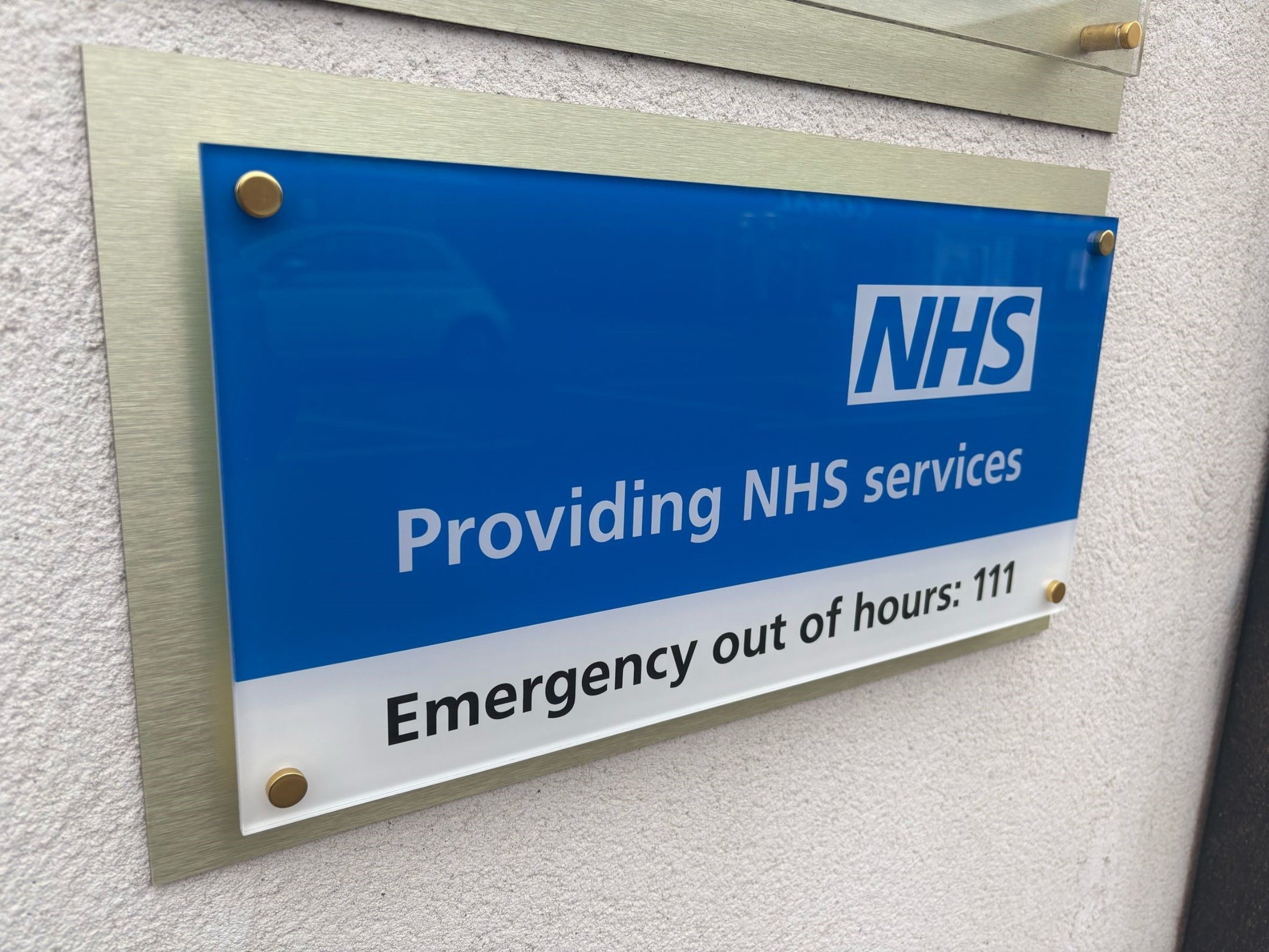 Acrylic NHS Sign for Bank House Dental in Wolstanton | Viro Display UK
